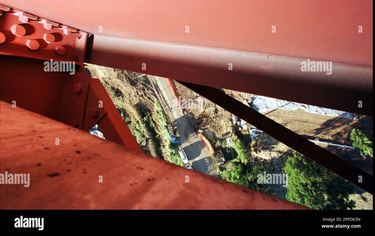 A nine-inch gap between the walkway and traffic lanes on the Golden ...