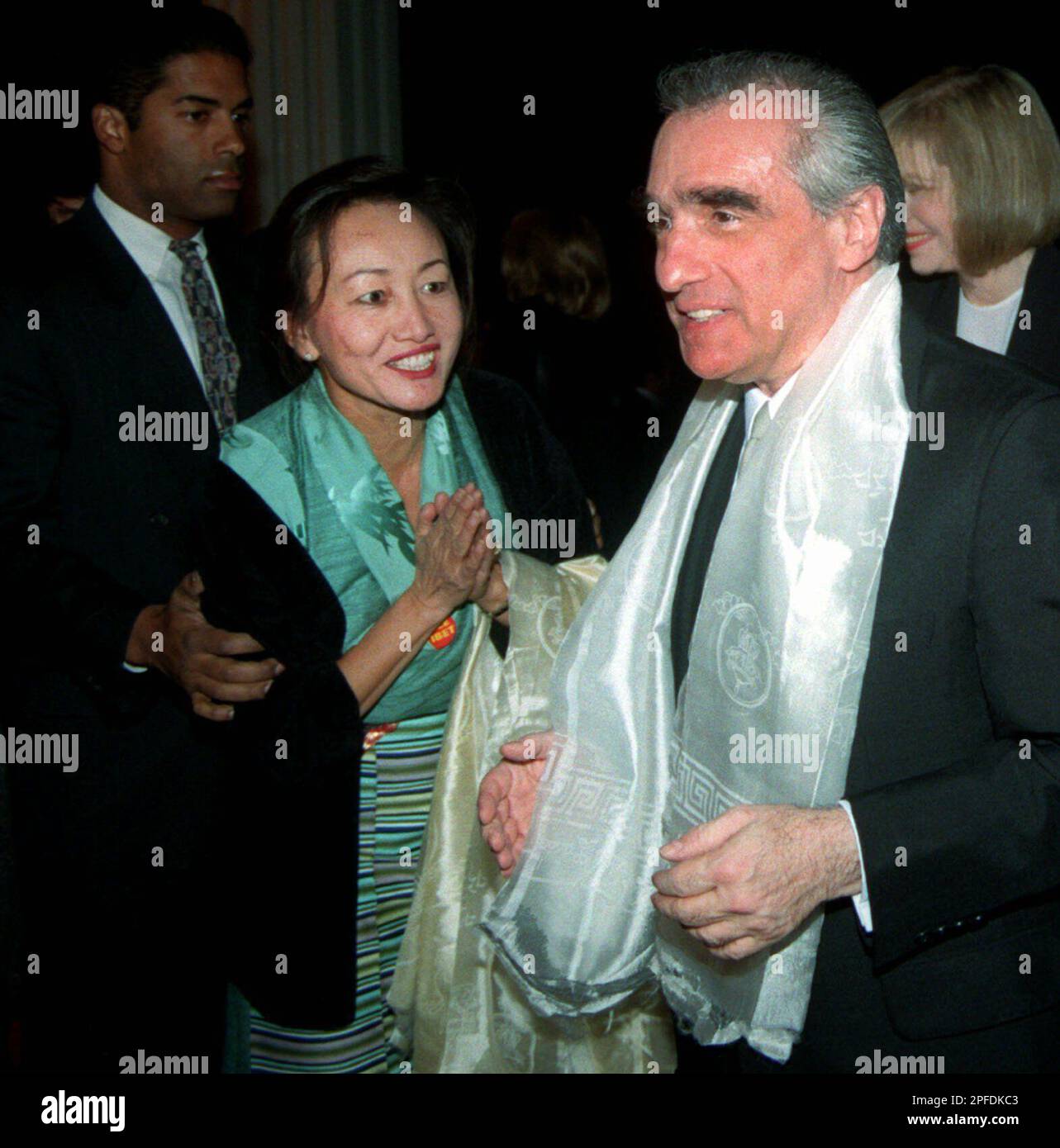 Director Martin Scorsese, right, is greeted by an unidentified fan as ...