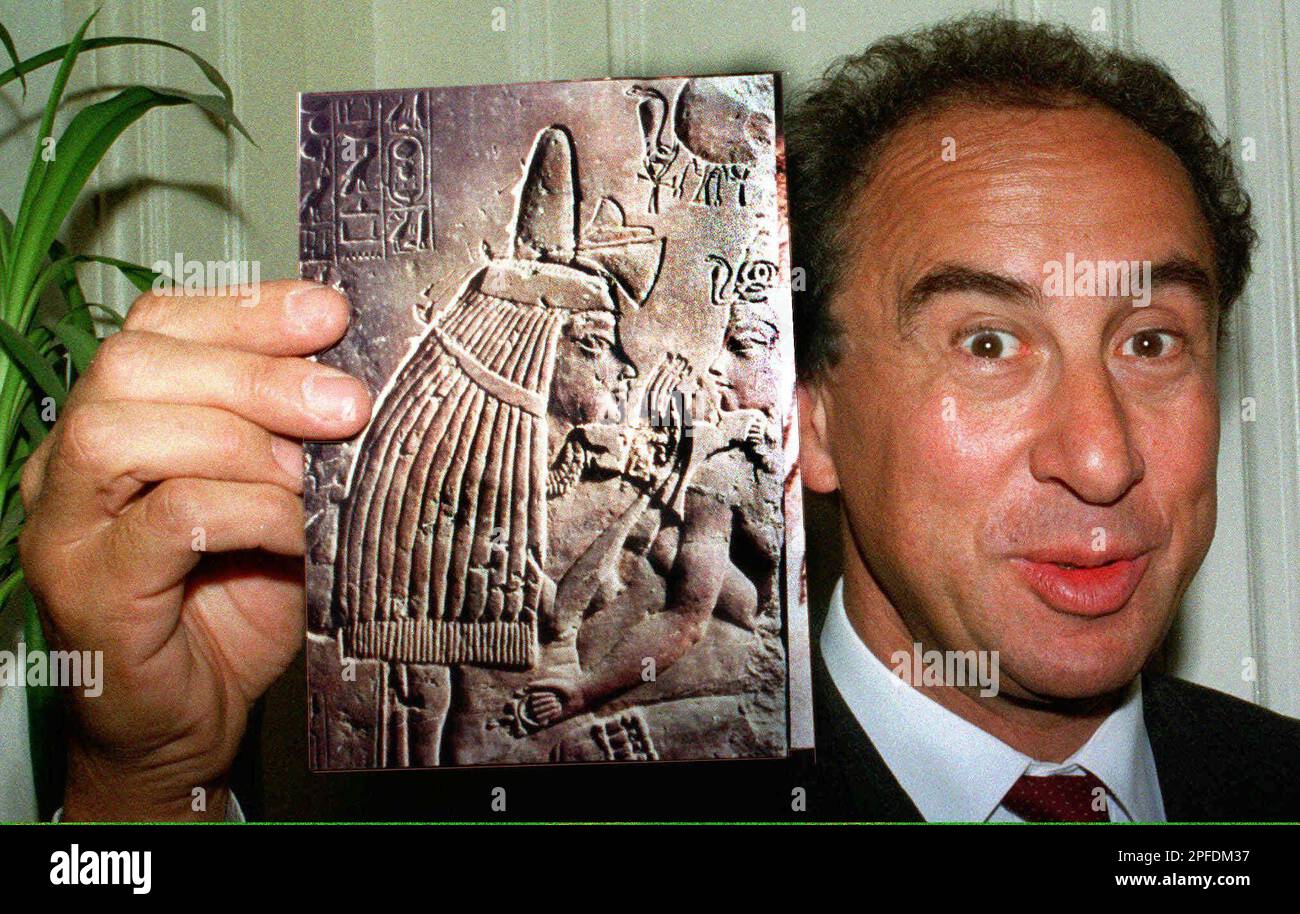 French archaeologist Alain Zivie Sunday, Nov 7, 1997 shows a photograph ...