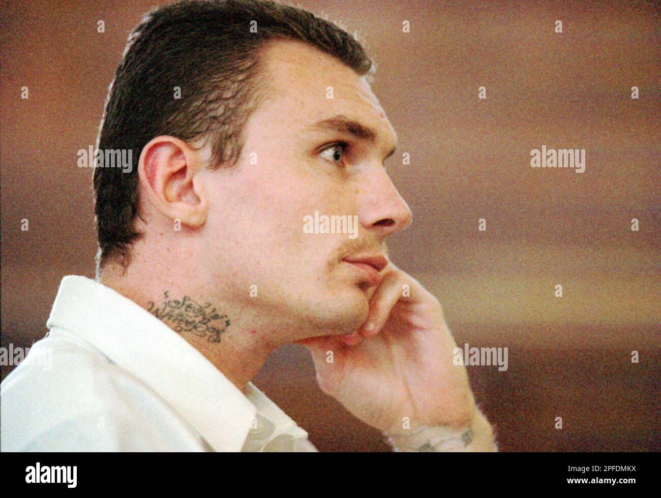 Defendant John Tague keeps a steady eye on his former friend Amy Tougas ...