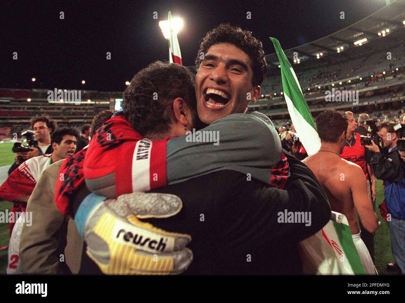 Iranian goal keeper Ahmad Reza Abedzadeh celebrating with an ...