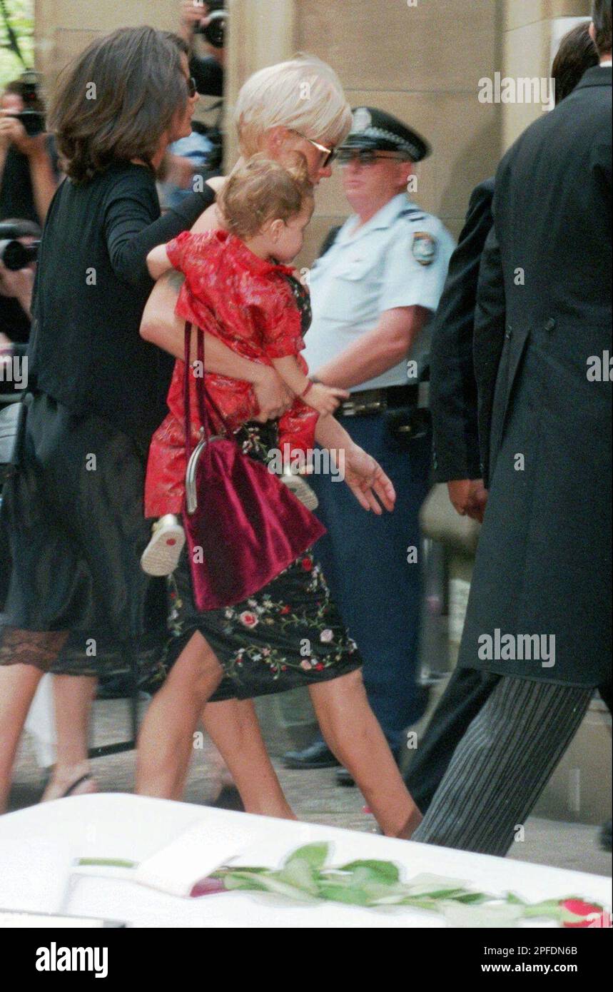 English TV star Paula Yates carrying her baby Heavenly Hiraani Tiger ...