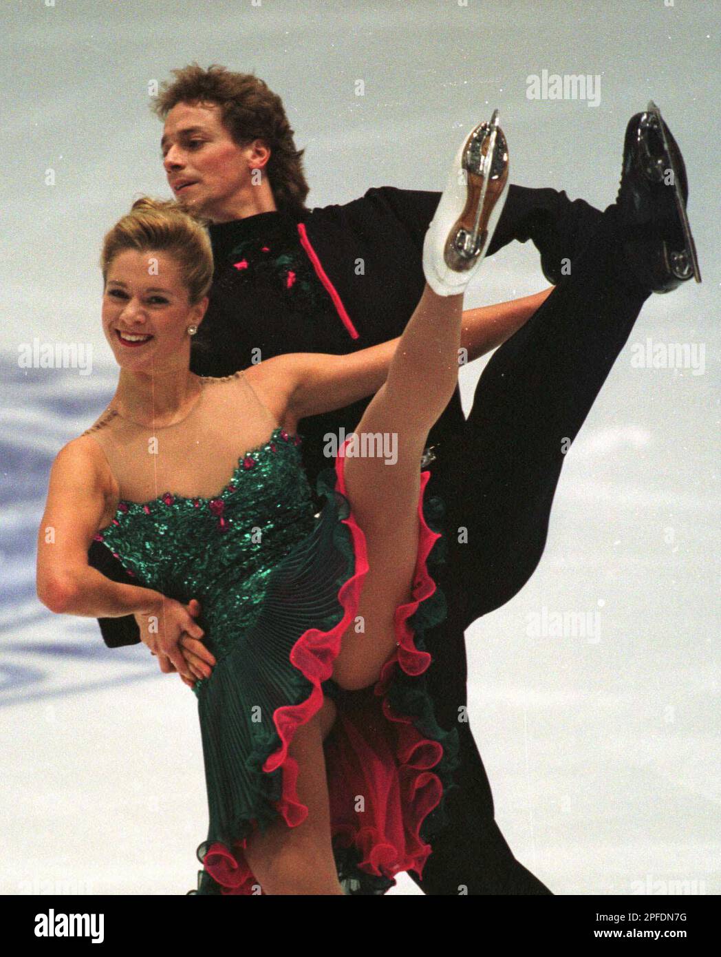 Canadian pair Shae-Lynn Bourne and Victor Kraatz perform during the ice dancing Compulsory event ...