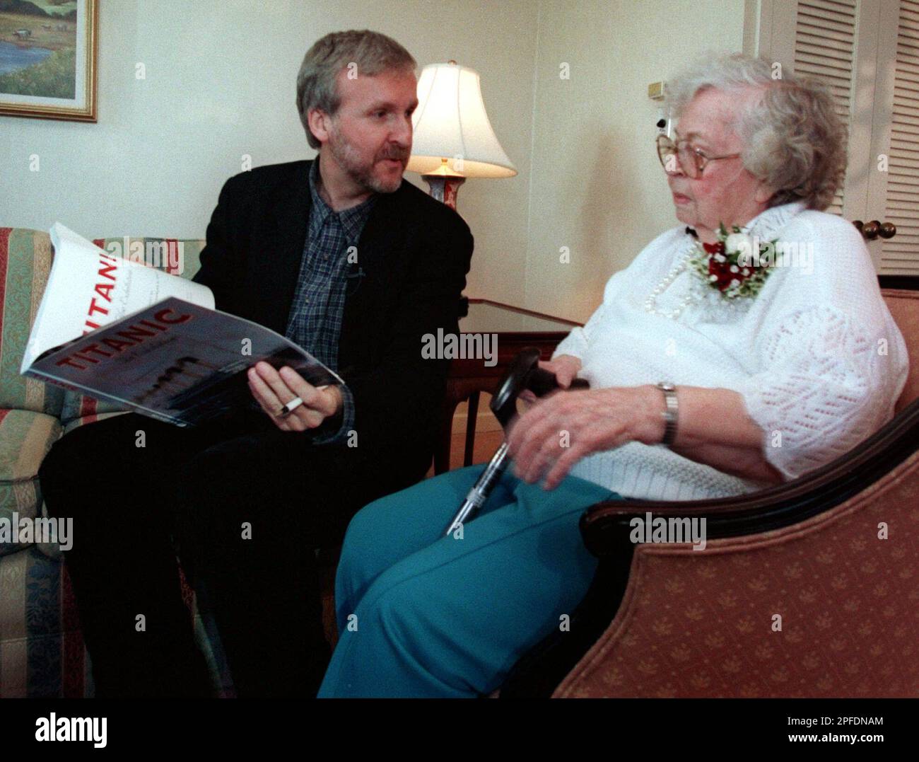 James Cameron, the writer/director of the movie "Titanic" looks through ...