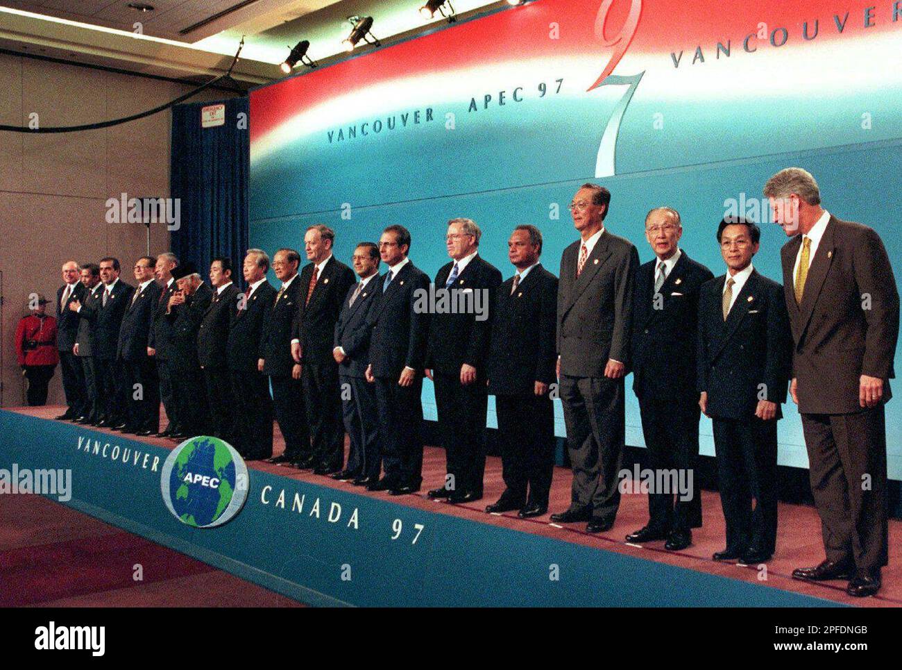 Leaders from the 18 APEC nations pose for a photo following their first meeting in Vancouver ...