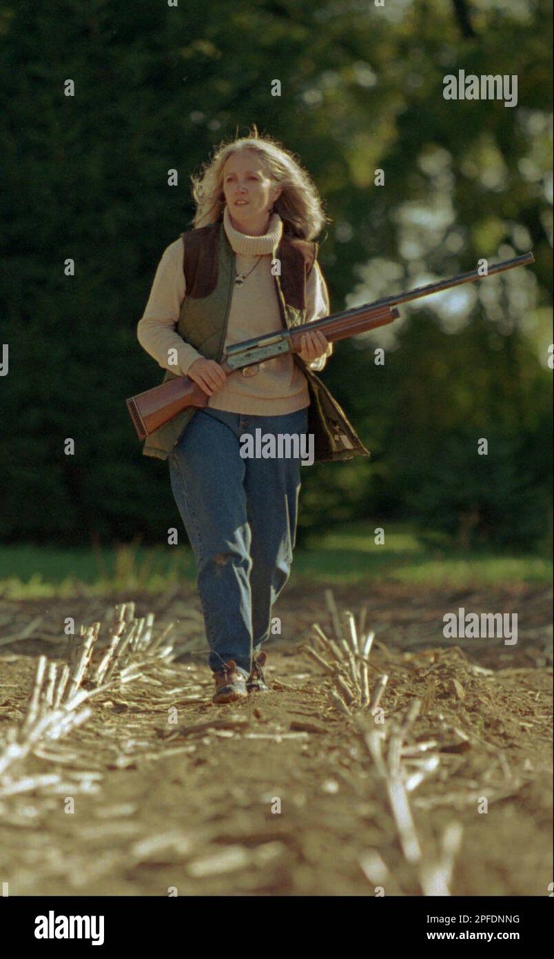 Skidmore professor Mary Stange walks in a cornfield near her home ...
