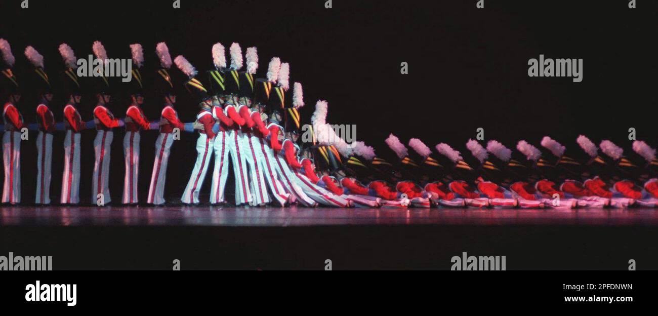 FILE--Thirty-two Rockettes demonstrate the domino effect at the ...