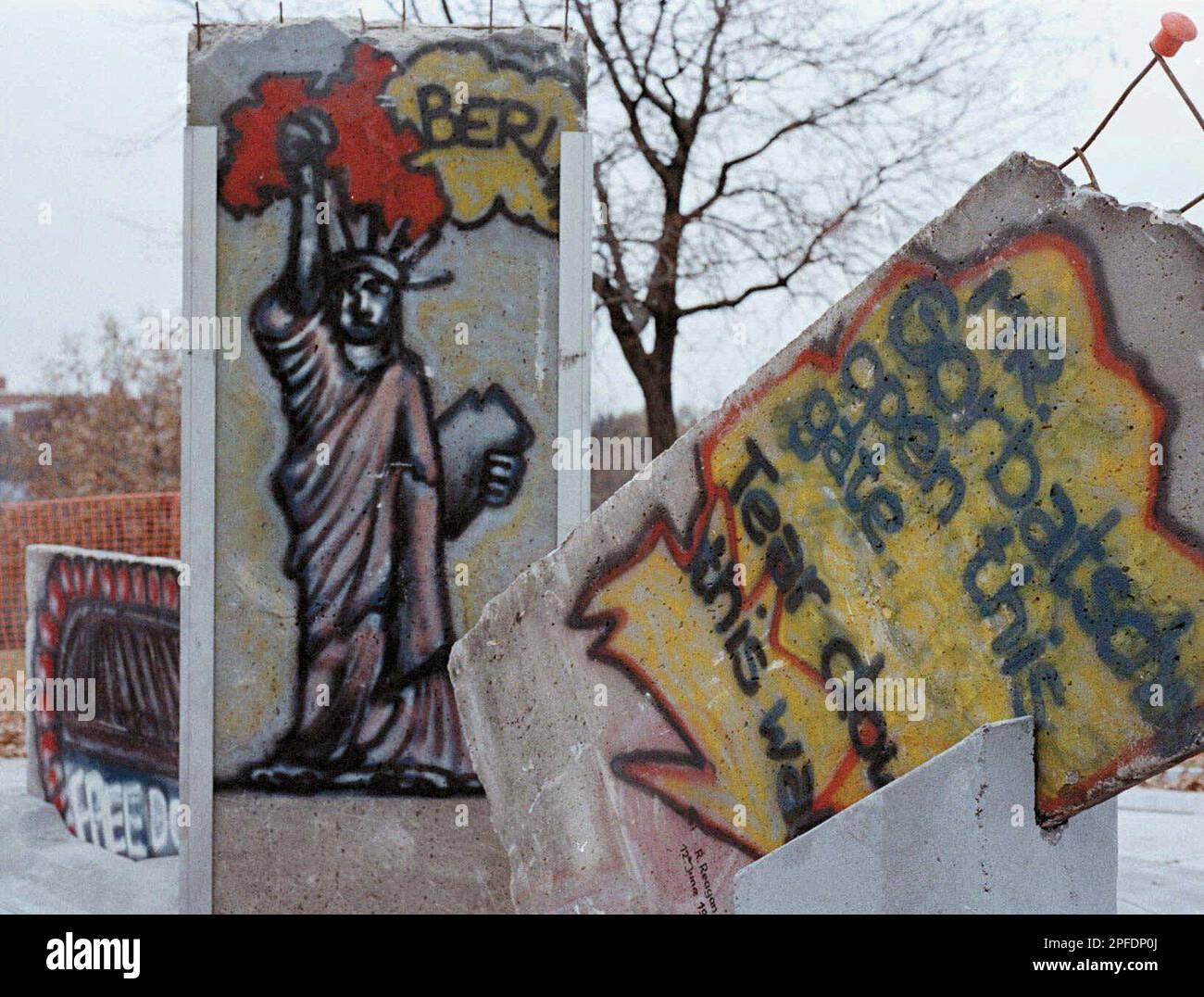 Three original slabs of the Berlin Wall are being used in a monument at ...