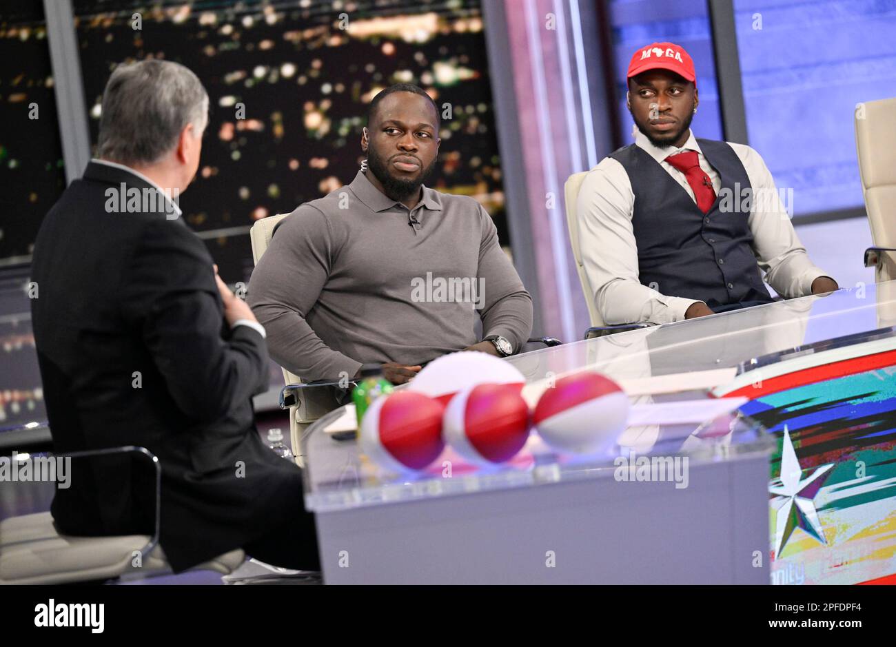 Fox News commentator Sean Hannity, left, interviews brothers Abimbola ...