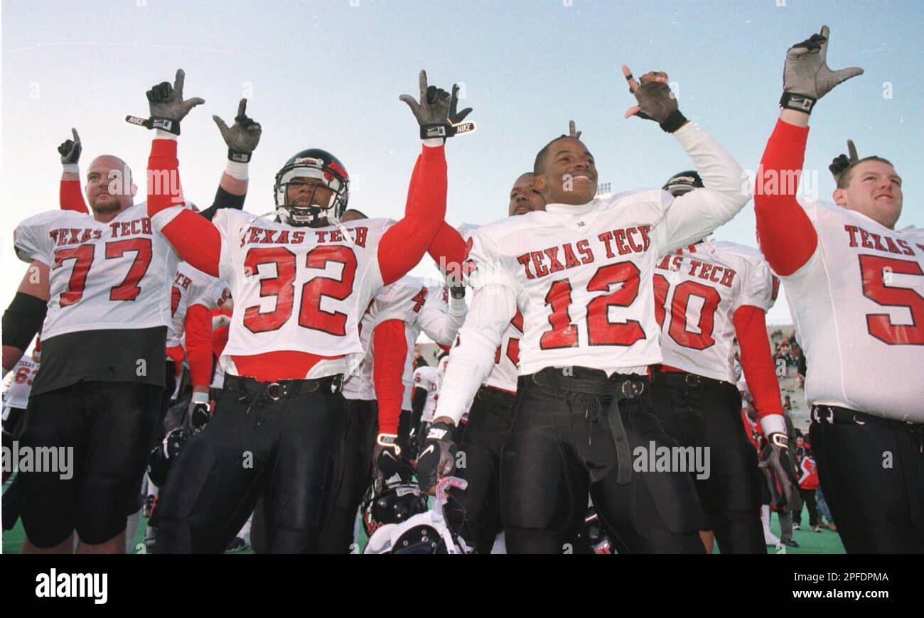 Texas Tech players, Erik Carruth, left, James Easterling, Rickey Hunter ...