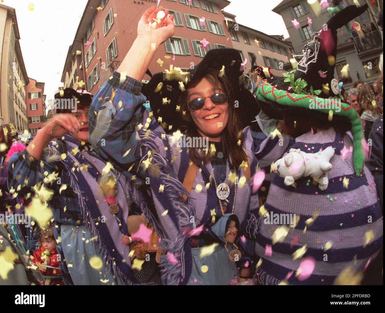 People dancing trough the streets in Zurich during the start of Swiss ...