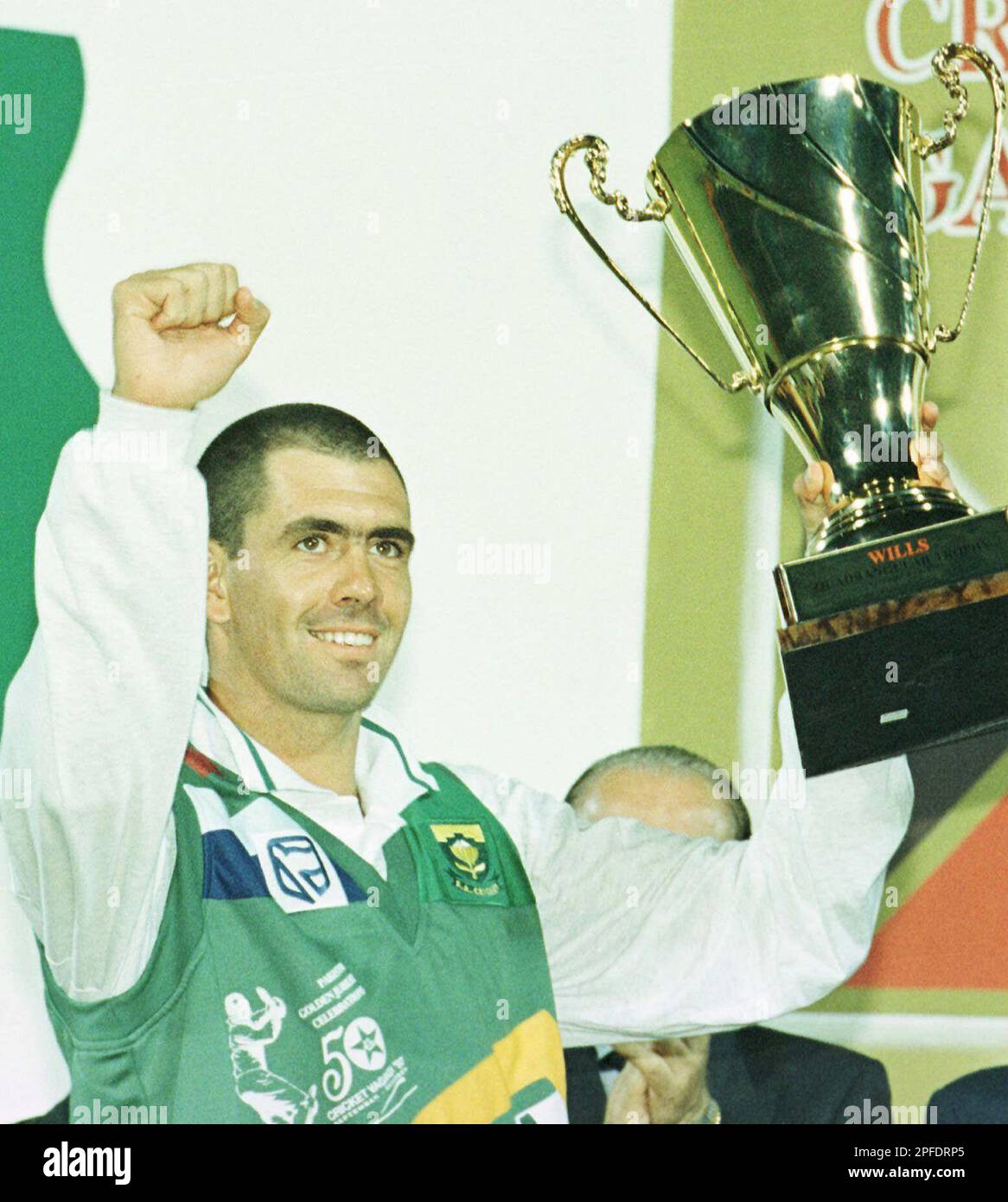 Hansie Cronje of South Africa jubilates with the trophy Saturday, Nov 8 ...