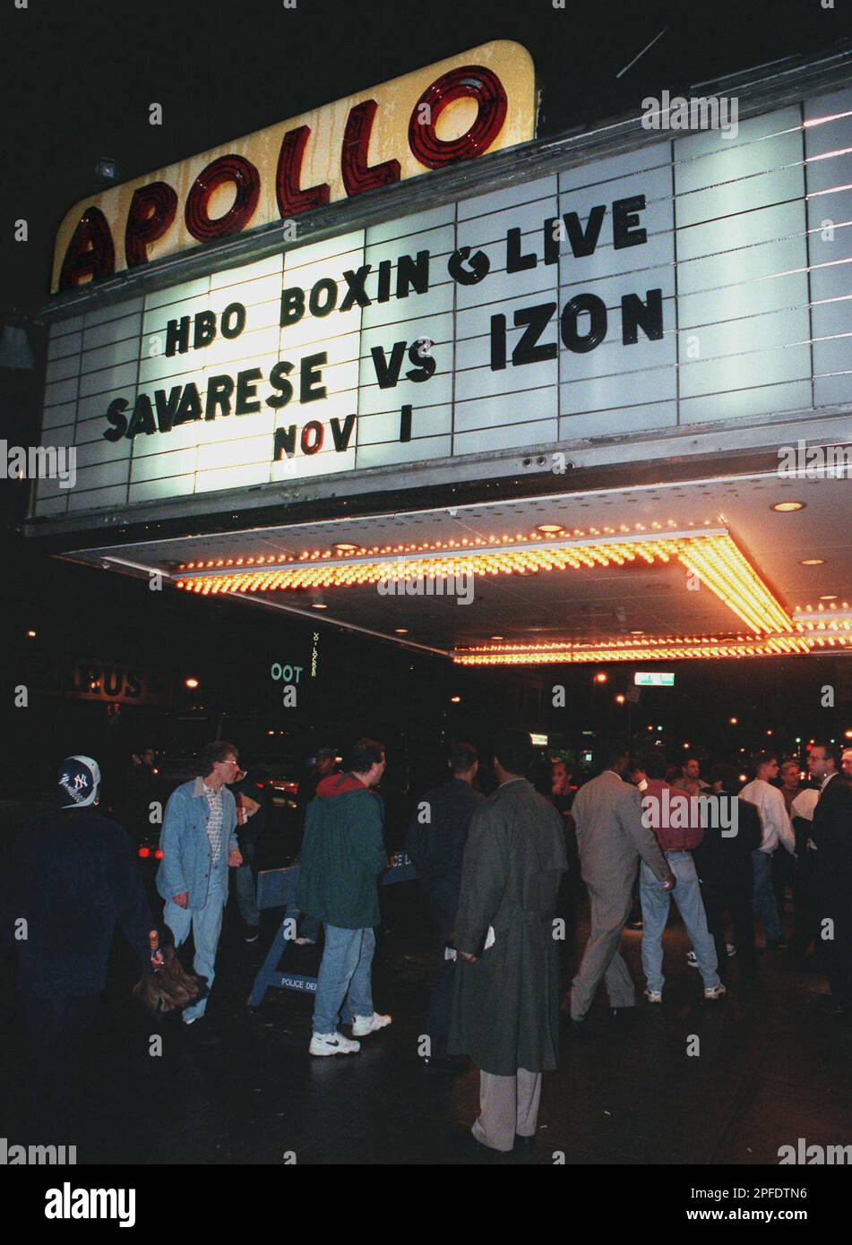 Boxing fans stream into the Apollo Theatre in Harlem Saturday, Nov. 1 ...