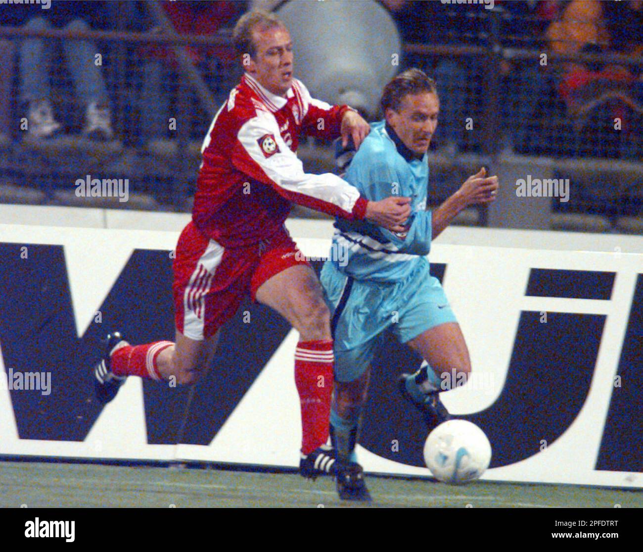 1860 Munich's Horst Heldt, right, fights for the ball with Bayern's ...