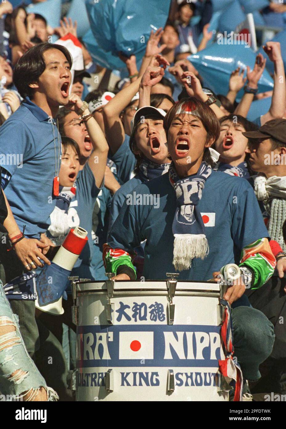 Japanese soccer fans cheer up during the Group B Asian Game between ...