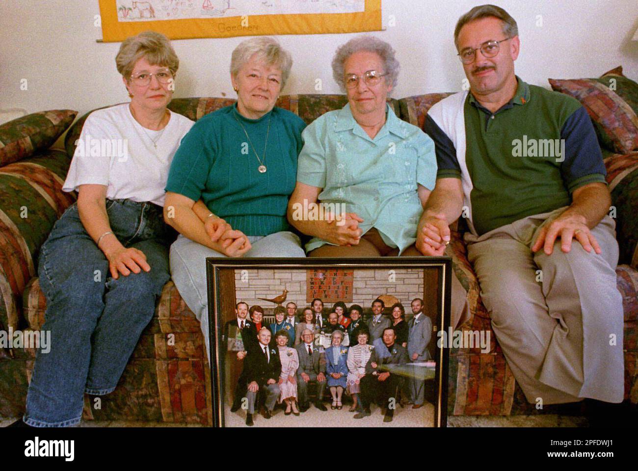 Four members of the Goedken family pose at Mary Goedken's home, Sept ...