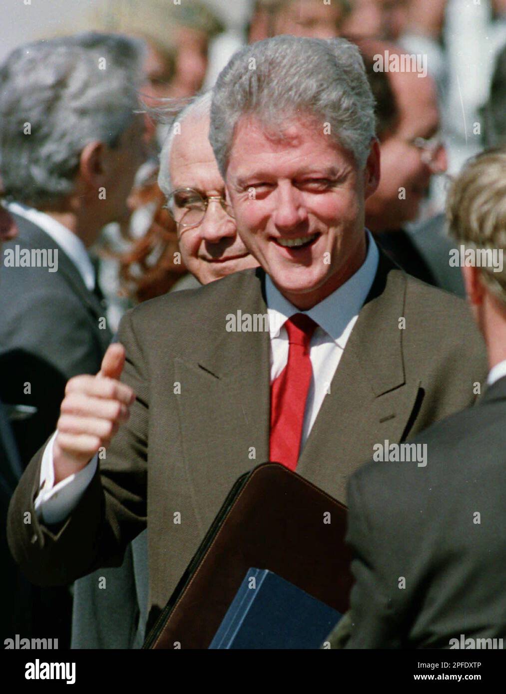 President Bill Clinton makes a thumbs up to an Argentine comedian who ...