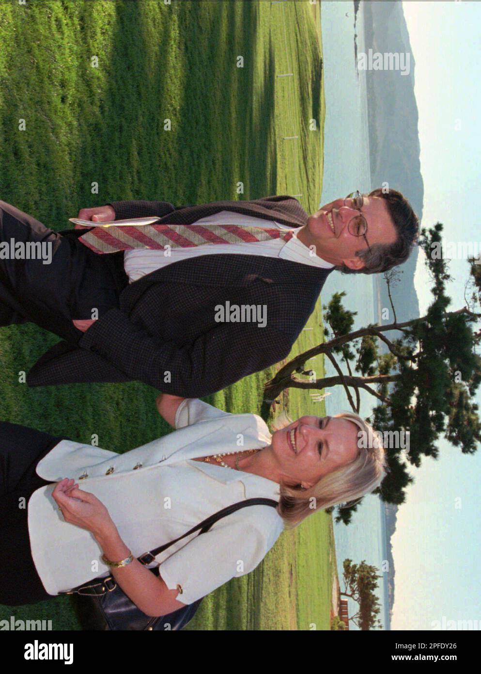 Myron Scholes walks to a conference in Pebble Beach, Calif., with his ...