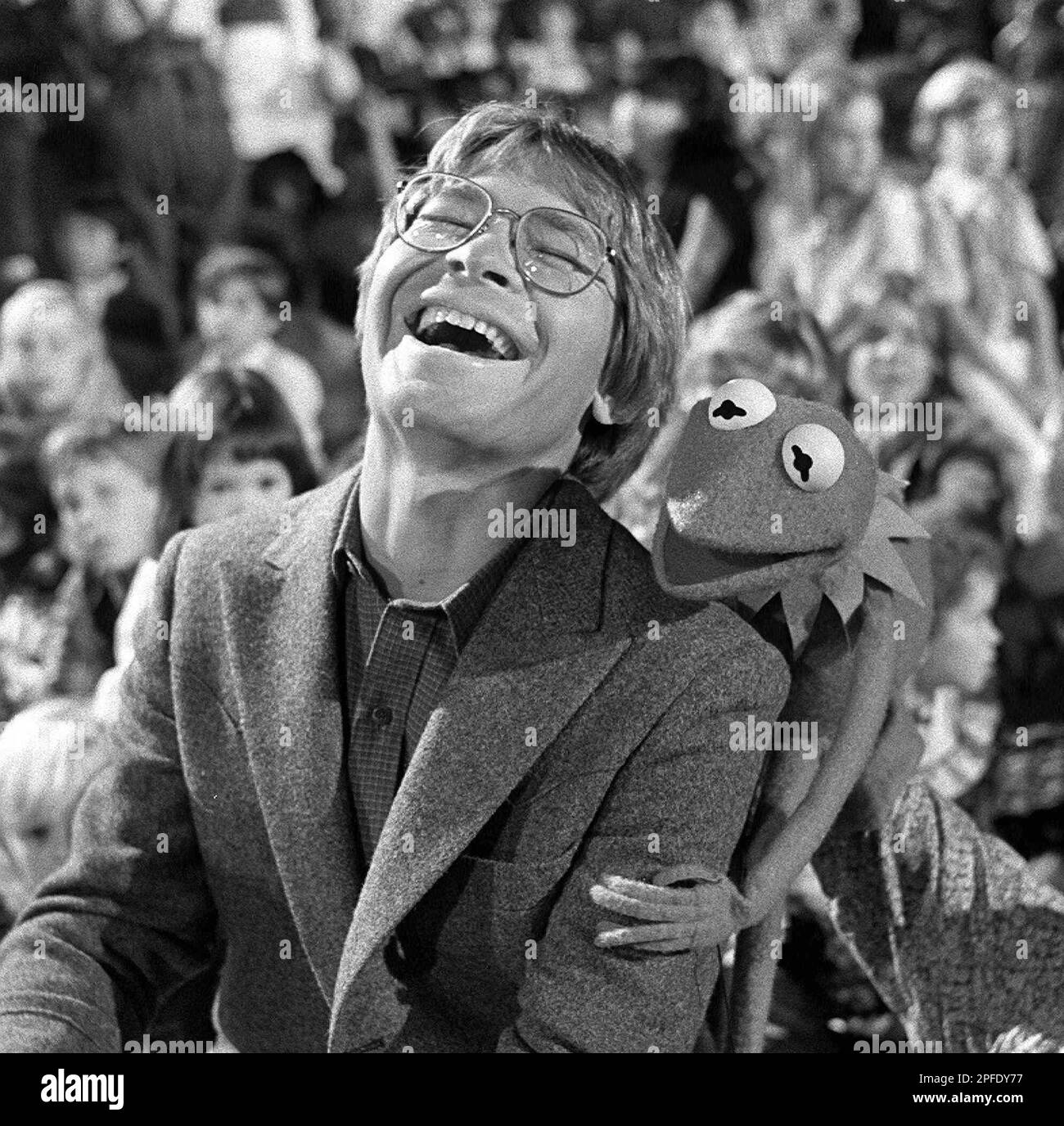 John Denver and Kermit the Frog laugh during the taping of a Muppet ...
