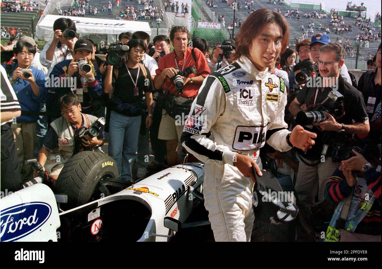 Japan's Toranosuke Takagi walks away from a photo session after Tyrrell ...