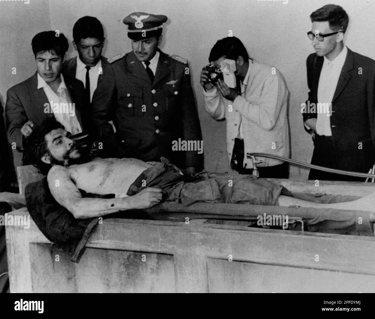 FILE -- Bolivian Army officers at Vallegrande, Bolivia, display what ...