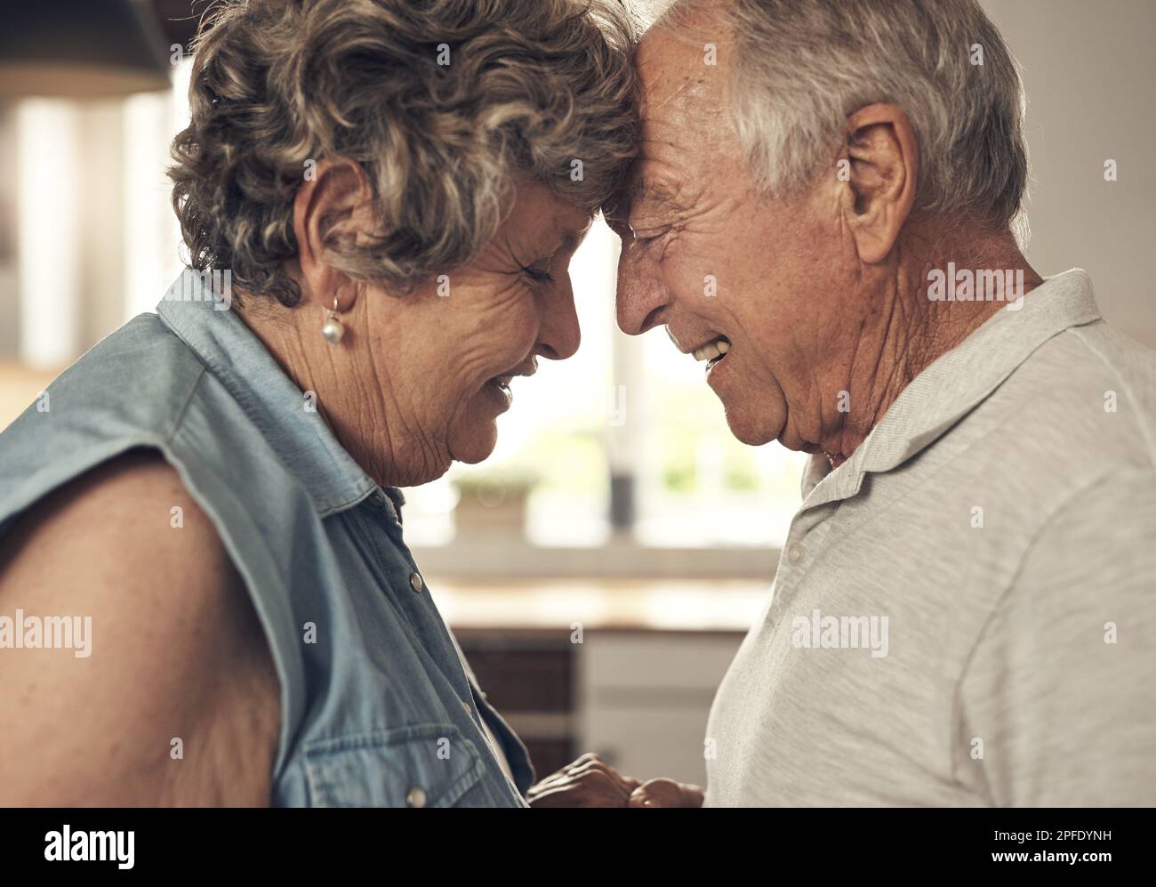 Our love never grows old. a senior couple embracing at home Stock Photo ...