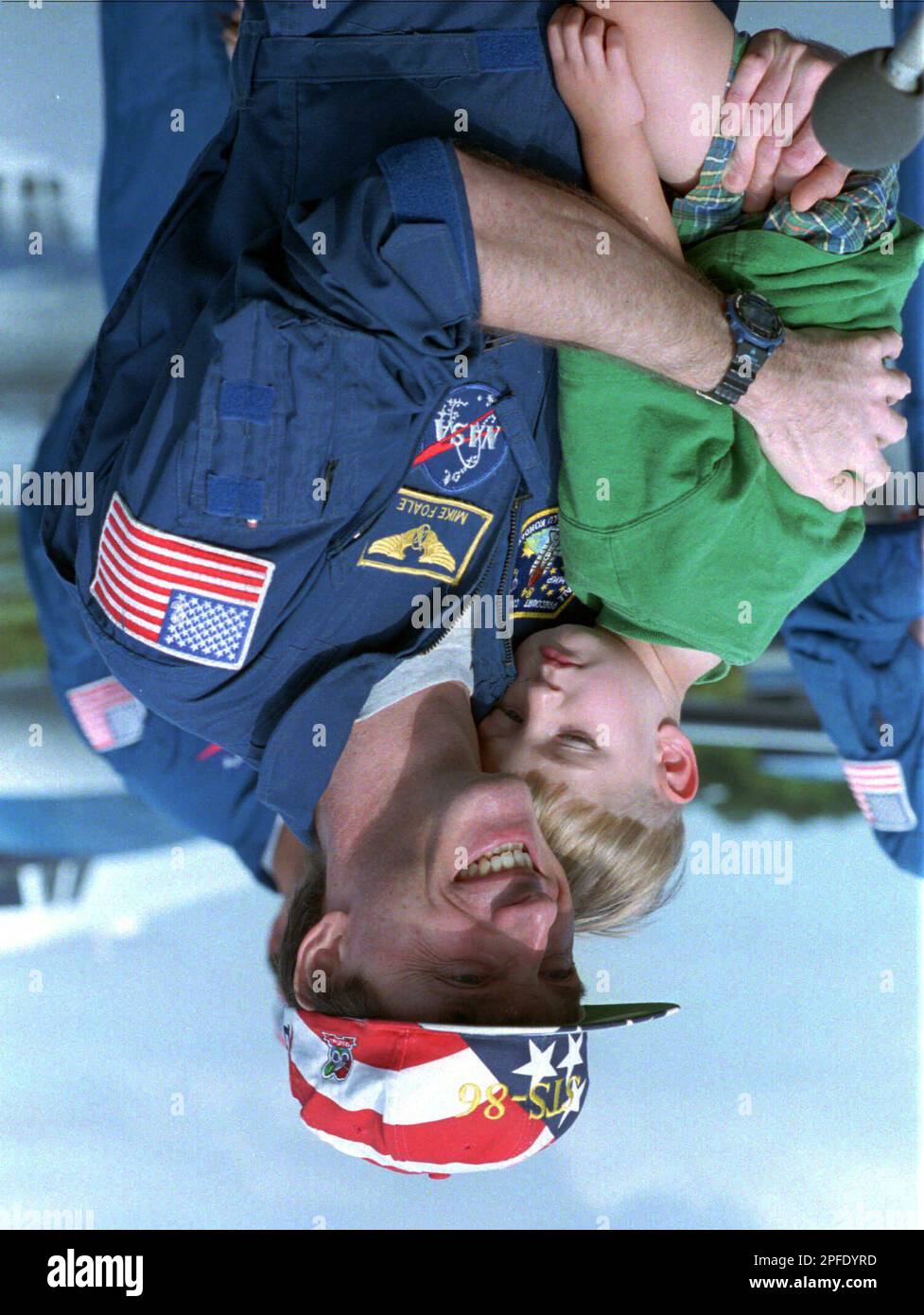 Astronaut Mike Foale smiles as he meets the media at Cape Canaveral Air ...