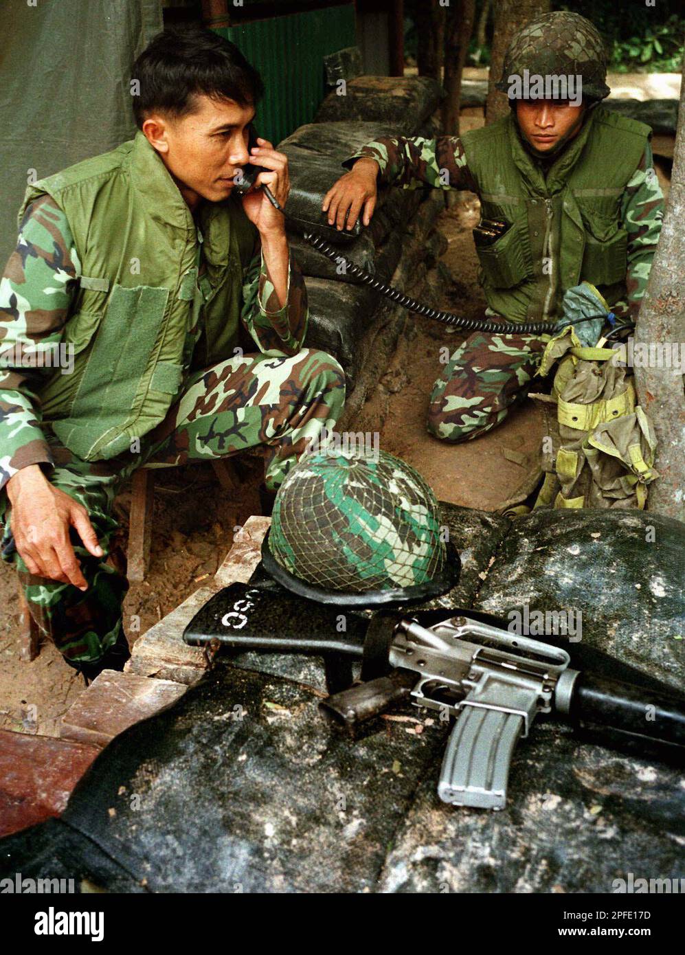 Sgt. Maitree Somon, left, and Pvt. Sangduen Boonkla receive ...