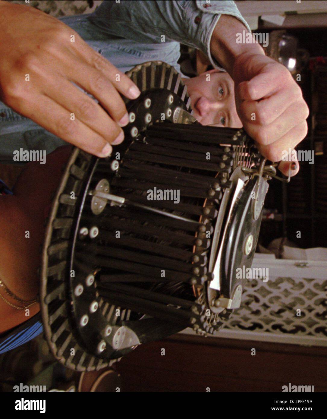 Custom hatmaker Gary White uses a 150-year-old device called a ...