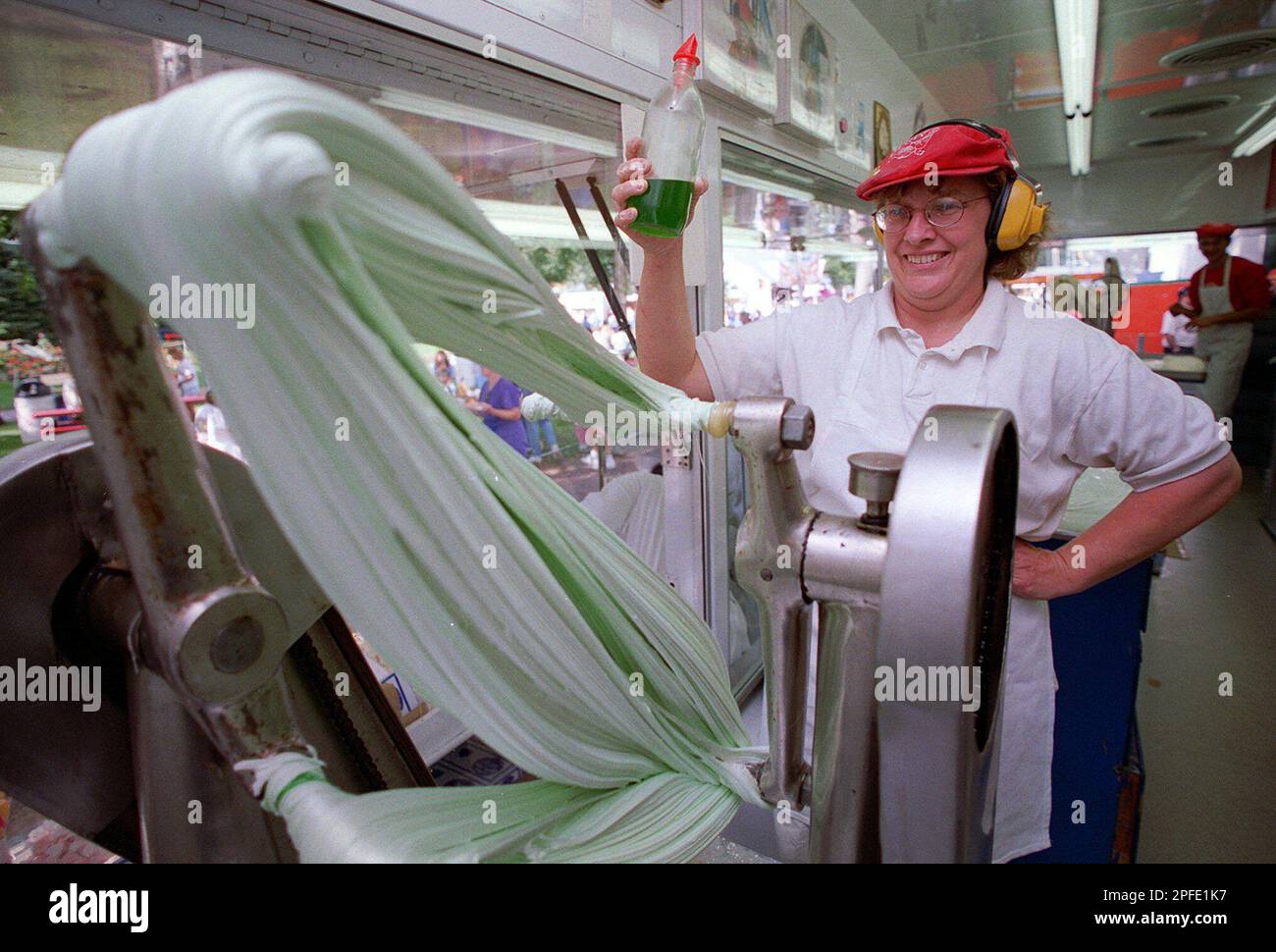 Mary Oz adds mint flavoring to fresh and gooey salt water taffy at her ...