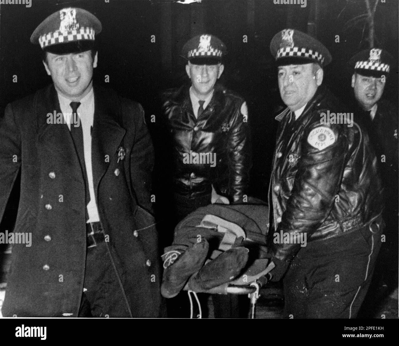 Chicago police remove the body of Fred Hampton, leader of the Illinois ...