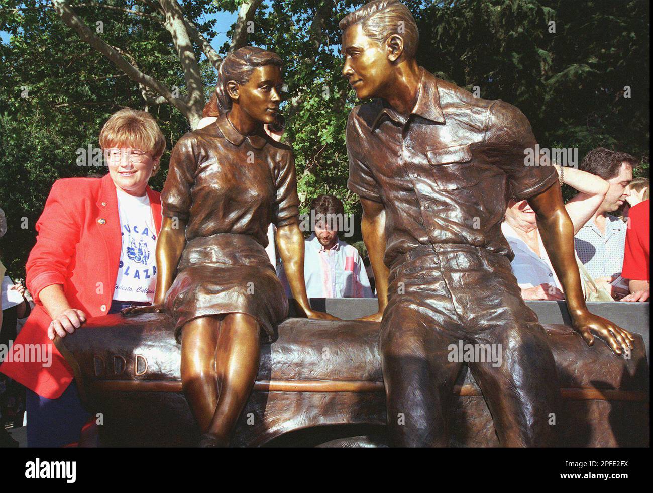 Artist Betty Saletta poses after helping to unveil her life-size bronze ...