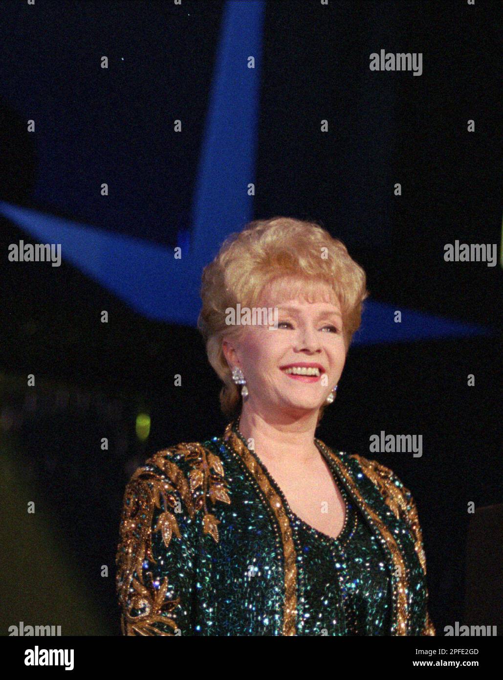 Actress Debbie Reynolds smiles as she receives the Legend Award ...