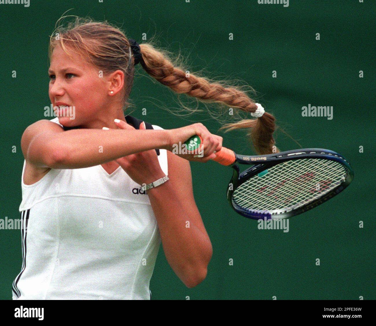 Russia's Anna Kournikova returns to Barbara Rittner of Germany, during ...