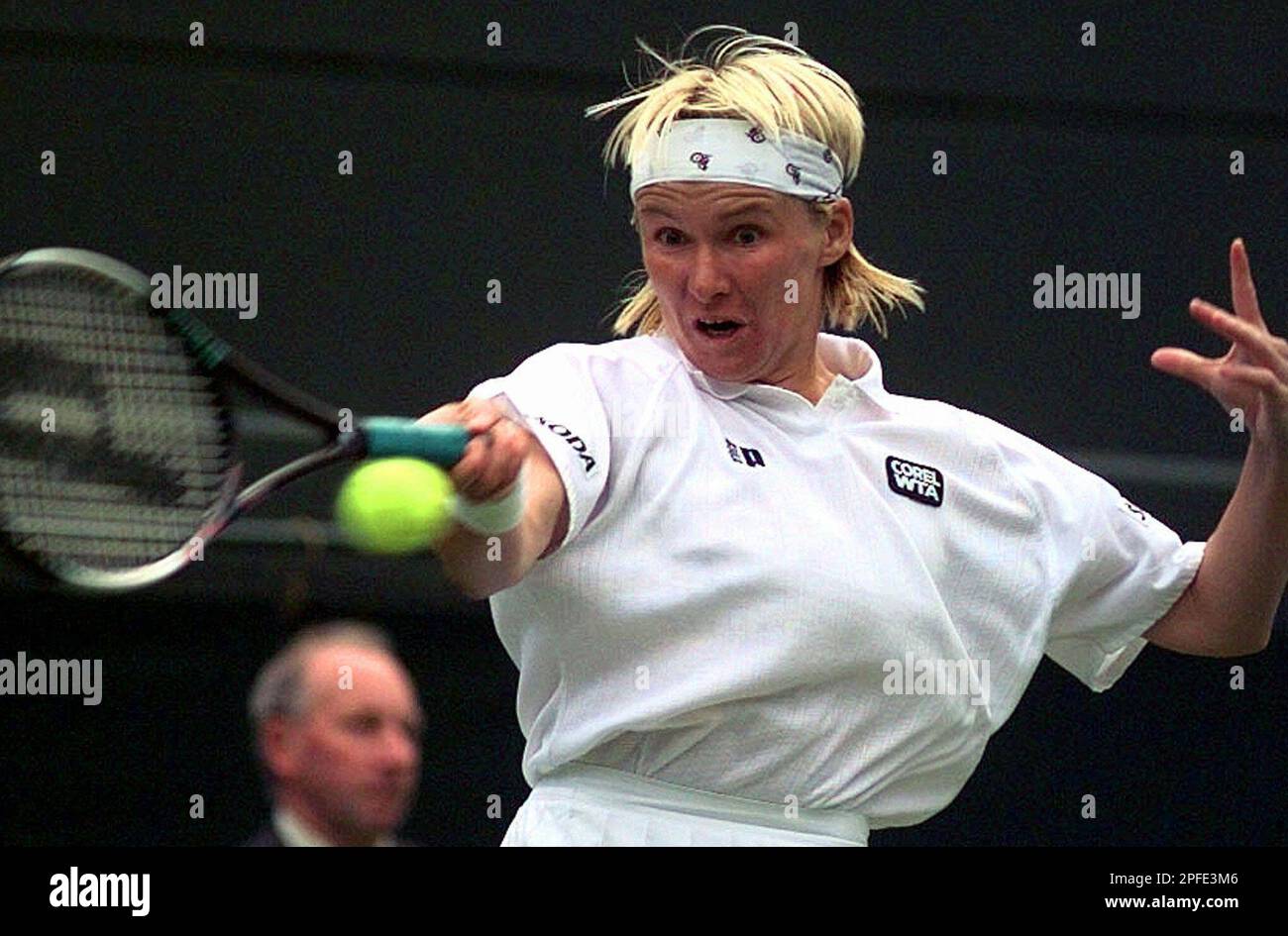 Jana Novotna of the Czech Republic plays a forehand return to Wiltrud ...