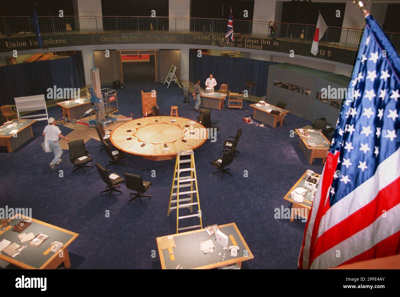 Workers prepare the general conference room at the Denver Public ...