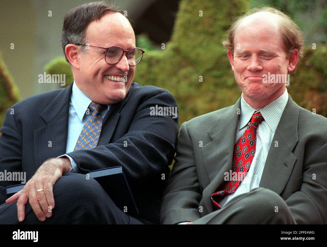 New York City Mayor Rudolph Giuliani, left, smiles at Ron Howard's ...