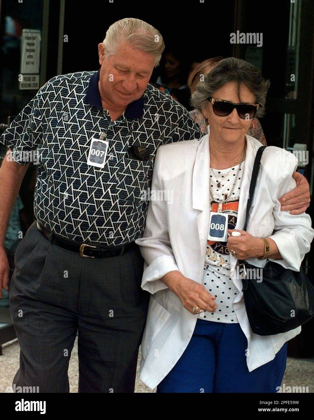 Charles and Blanche Tomlin walk out of the U.S. Courthouse in Denver ...