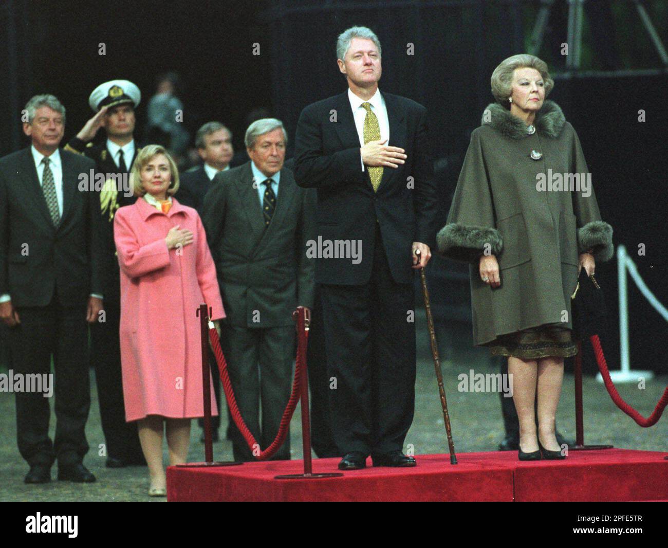 U.S. President Bill Clinton and Dutch Queen Beatrix listen to the ...