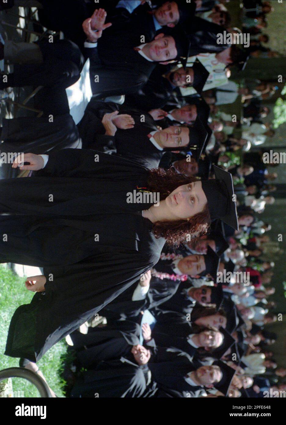 Actress Sarah Gilbert walks up to get her degree during a ceremony at ...