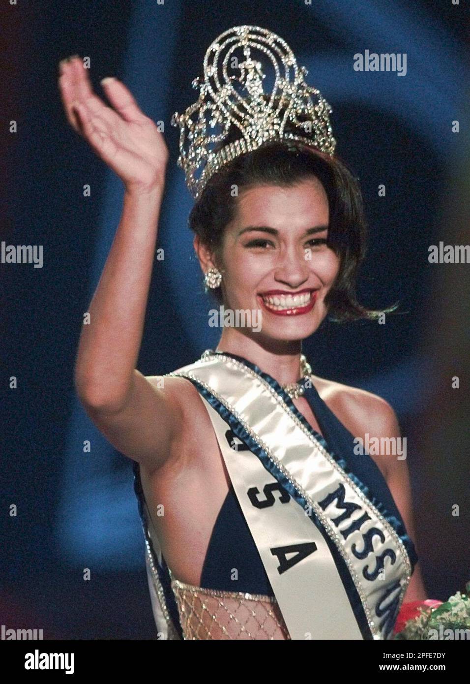 Miss USA, Brook Lee, of Hawaii, waves to the audience after being crowned 1997 Miss Universe in ...