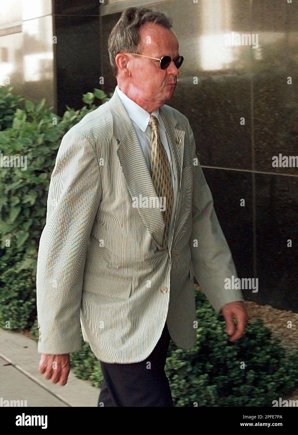 George Leckie, former aide to Gov. Fife Symington, hastily enters the U ...