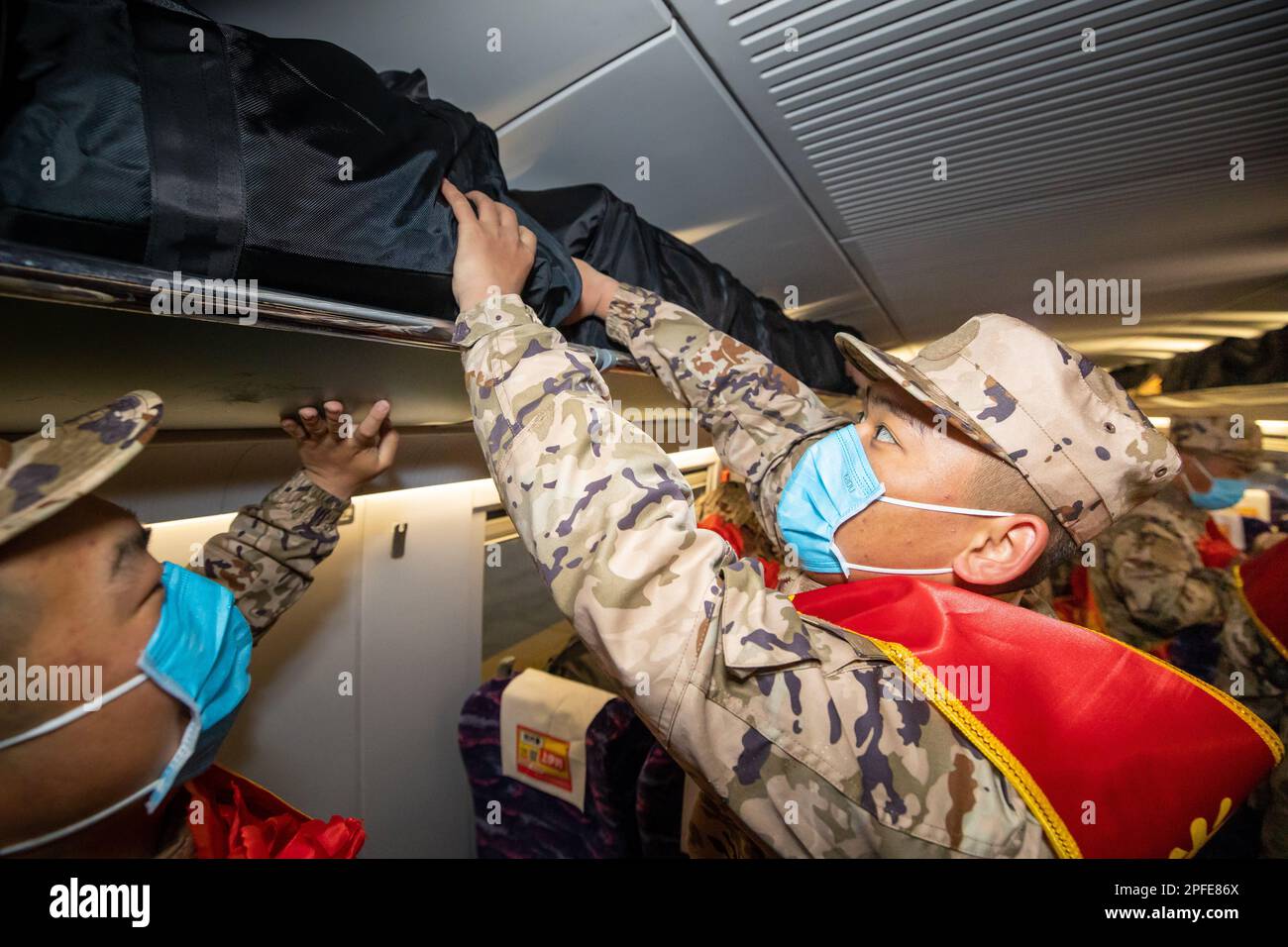 ZAOZHUANG, CHINA - MARCH 17, 2023 - New soldiers pack their luggage on ...