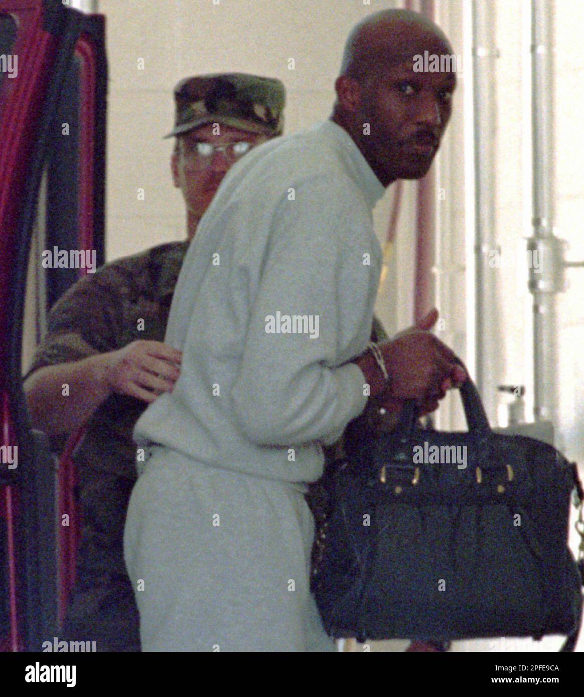 Former Army drill instructor Staff Sgt. Delmar Simpson, wearing ...