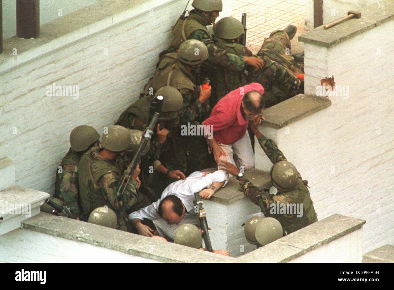 Peruvian soldiers help hostages escape from the Japanese ambassador's ...