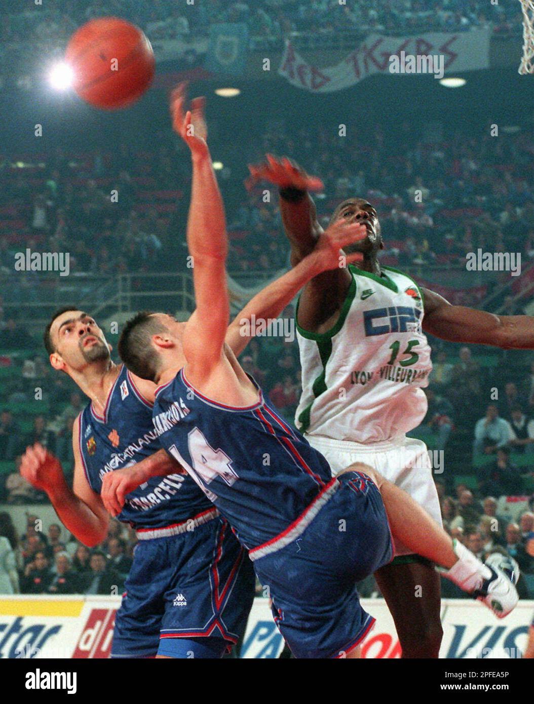 US Ronnie Smith of Asvel Lyon Villeurbanne, at right, stretches for a ...