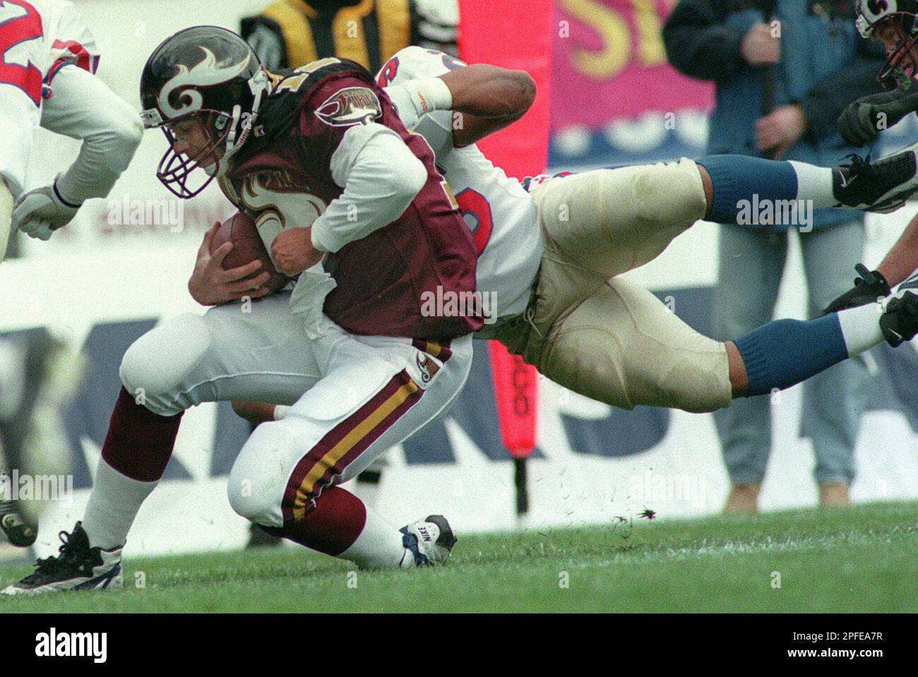 Quarterback T.J. Rubley, left, of the Duesseldorf Rhein Fire team is ...