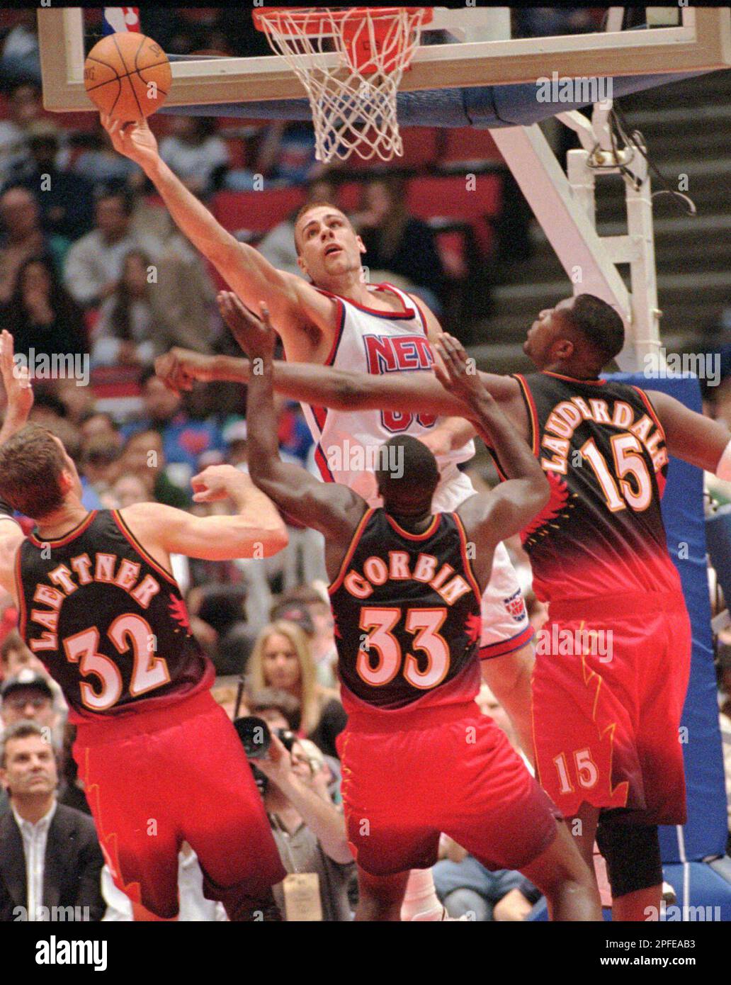 New Jersey Nets' Eric Montross goes up with a shot as Atlanta Hawks ...
