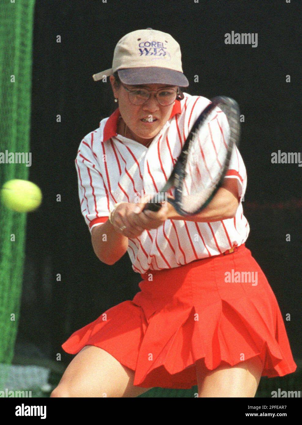 Kimberly Po, from Inkline Village, Nev., makes a double-handed forehand ...