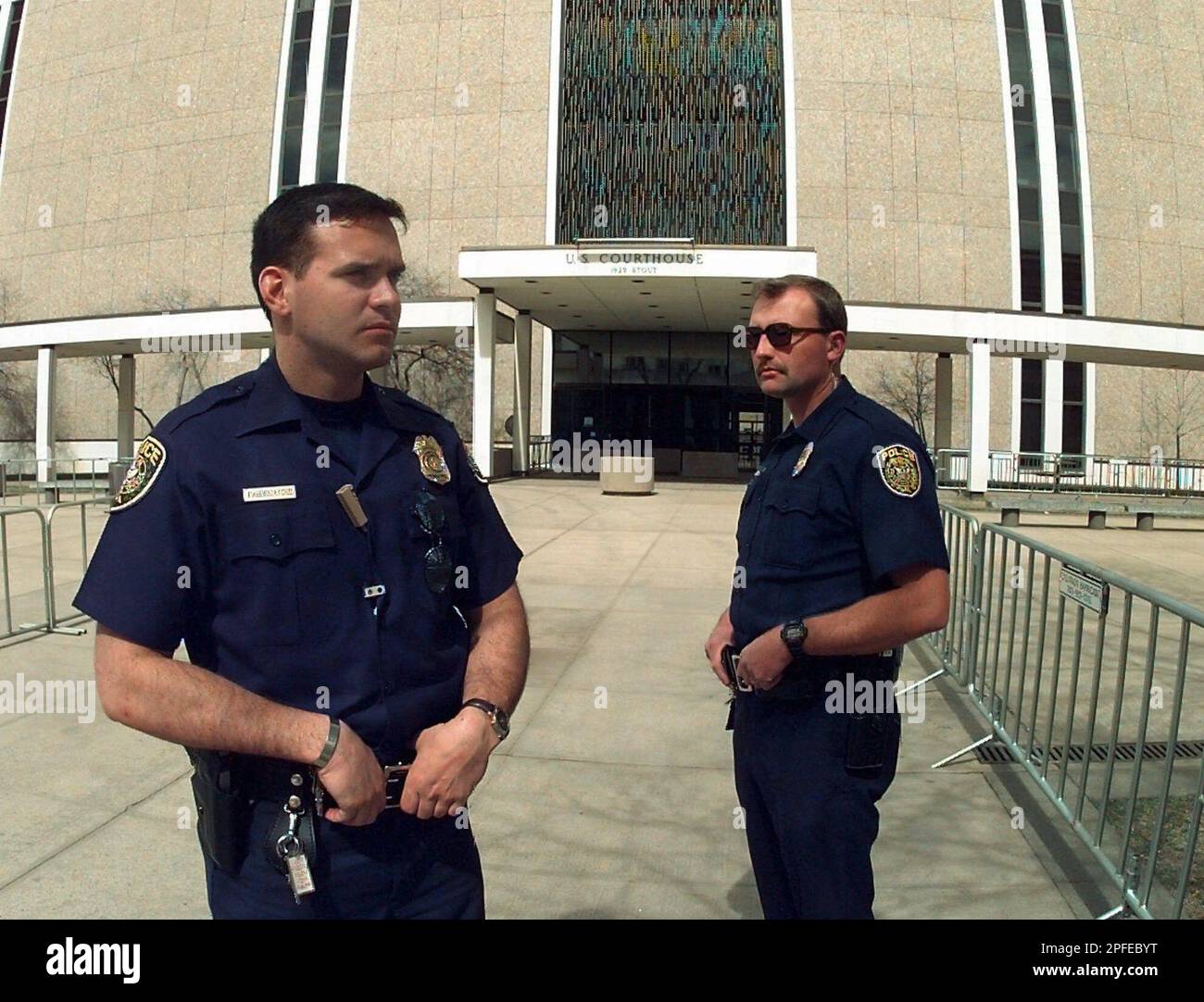 Federal police officers John Fabbricatore, left, and Thomas Keedy stand ...